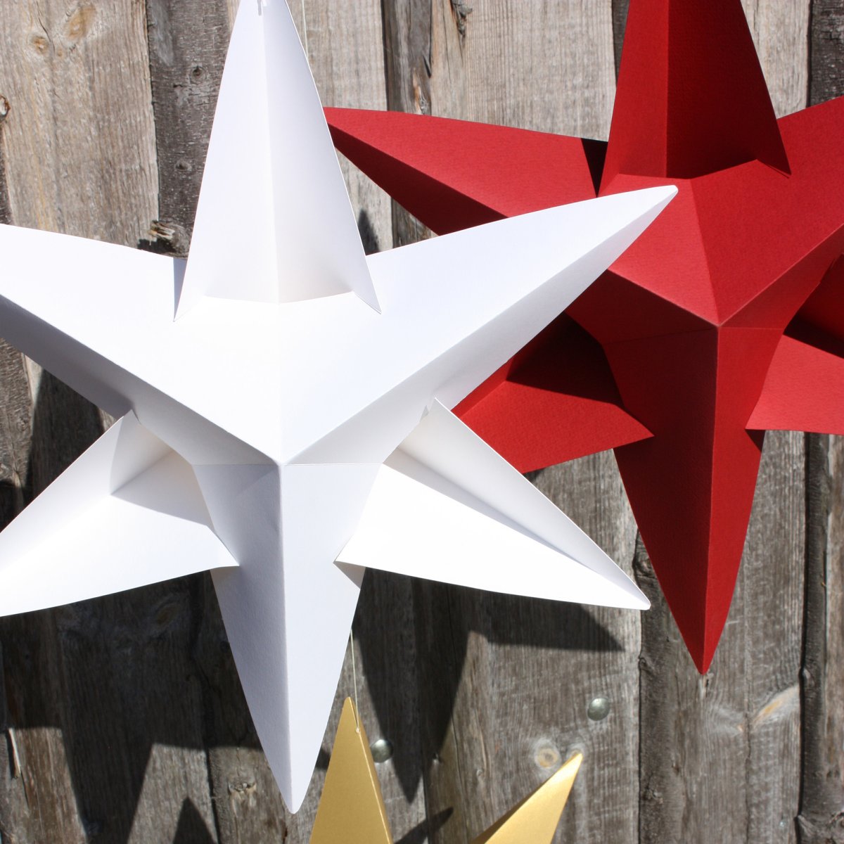 Stjerne julepynt fra Livingly - Stjerner i papir og træ til jul & deko